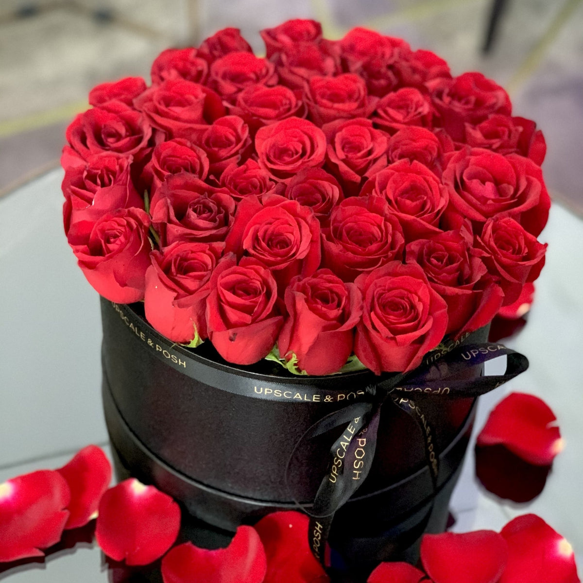 Red roses arrangement in a medium luxury round box | Flowers in a box ...