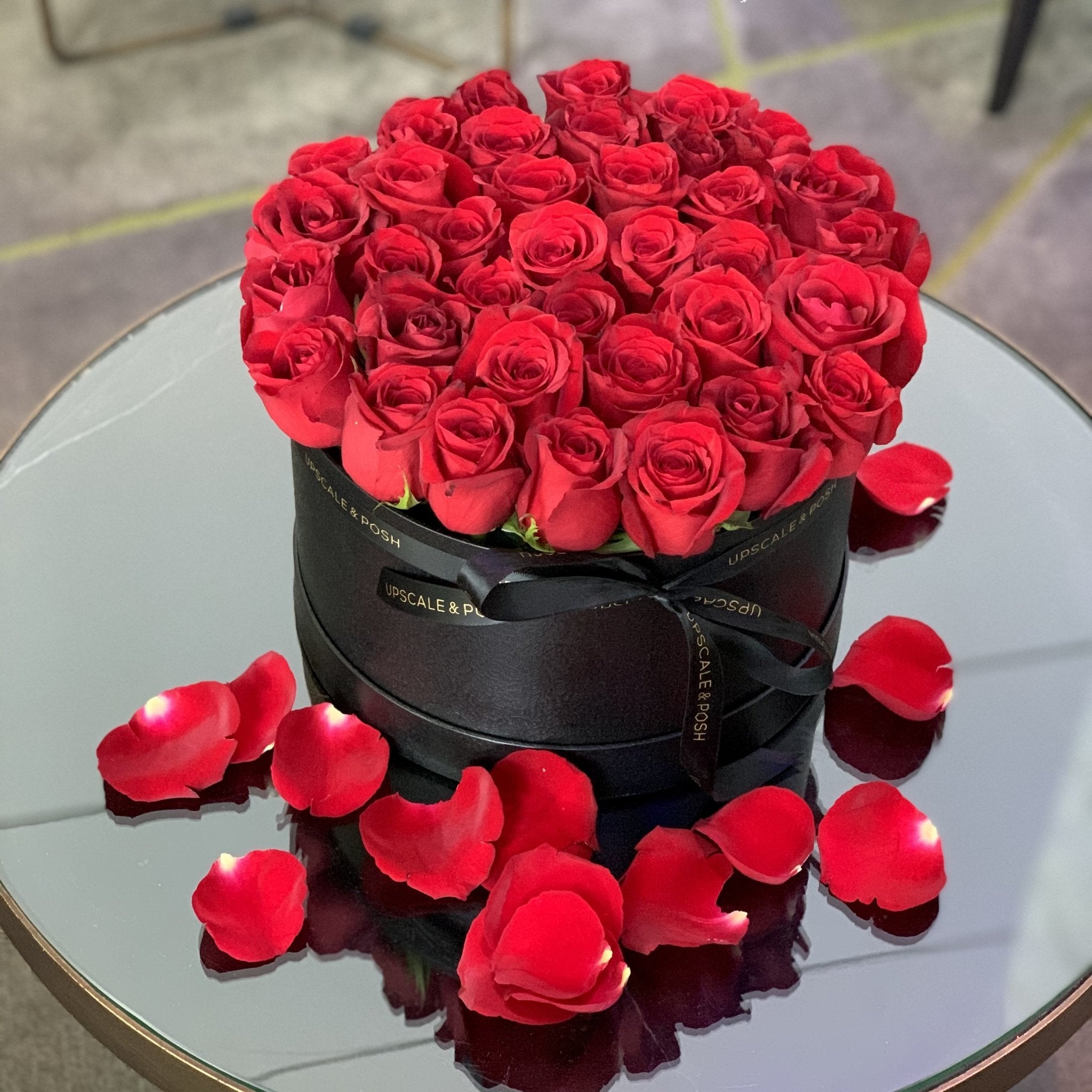 Red roses arrangement in a medium luxury round box | Flowers in a box ...